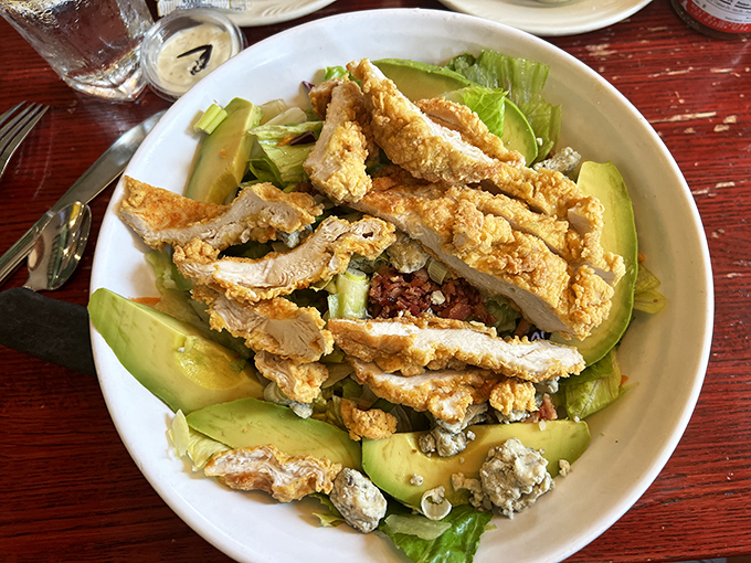 A salad that proves healthy eating doesn't have to be punishment, with crispy chicken adding some weekend fun to weekday greens.