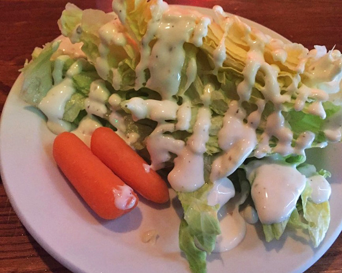 A salad that knows its role&mdash;fresh, crisp, and dressed just enough to complement rather than compete with the main event.