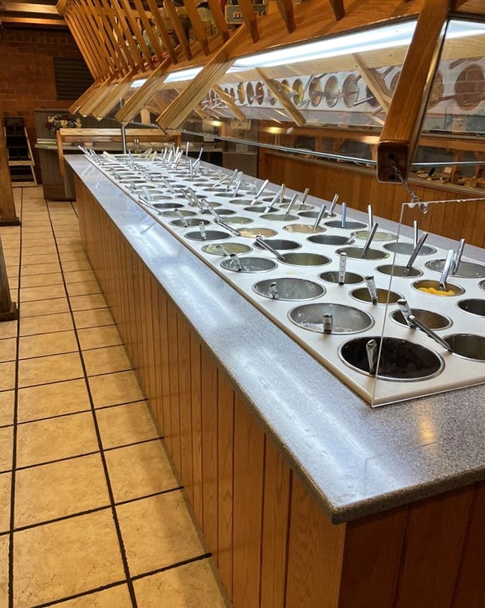 The salad bar&mdash;where vegetables go to fulfill their destiny. Those metal containers have held enough dressings to fill a swimming pool.