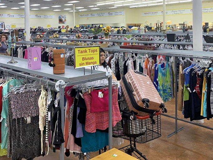 The multilingual signage reflects the diverse community Thrift Giant serves. Fashion transcends language barriers, especially at these prices.