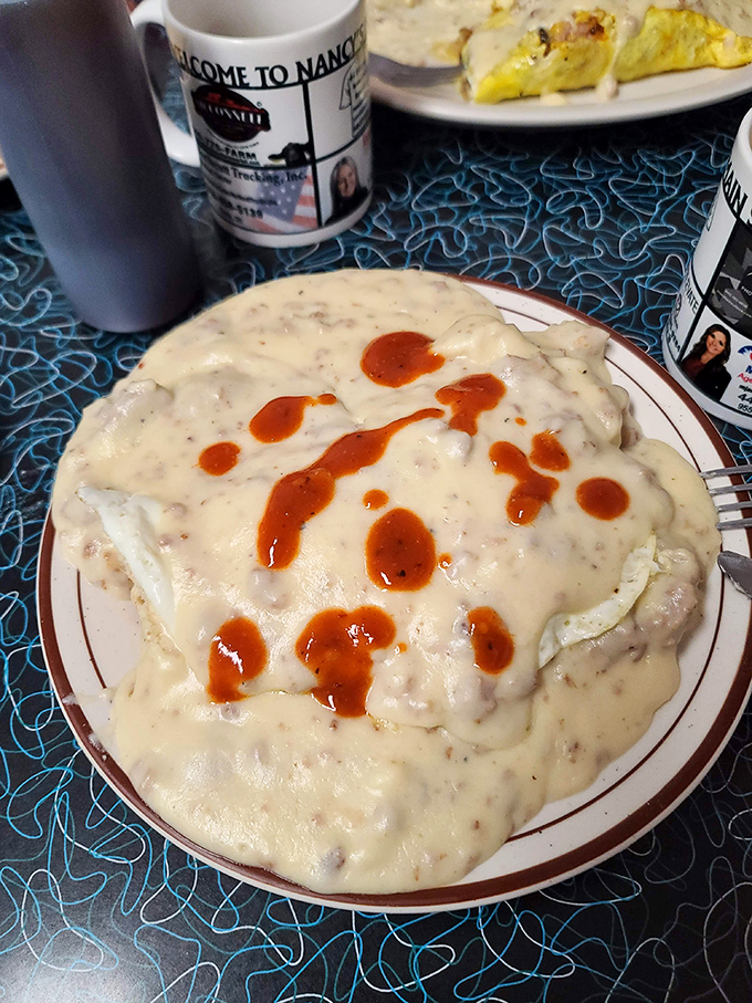 Biscuits and gravy—the breakfast that hugs you from the inside. This plate doesn't just say "good morning," it shouts "GREAT morning!"