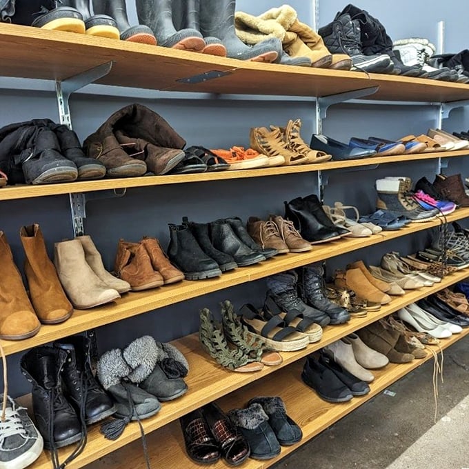 Shoe shelves: where hiking boots, work shoes, and fancy heels await their next adventure. Each pair holds the ghost of walks already taken.
