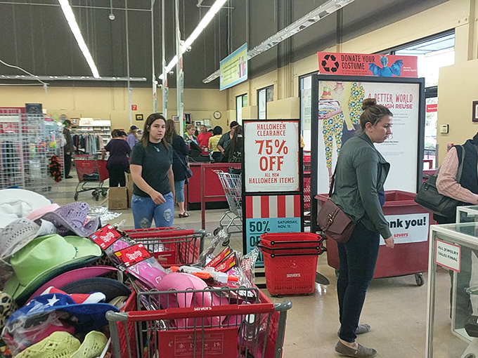 The checkout experience – where red baskets overflow with possibilities and shoppers experience the unique thrill of thrift store victory.
