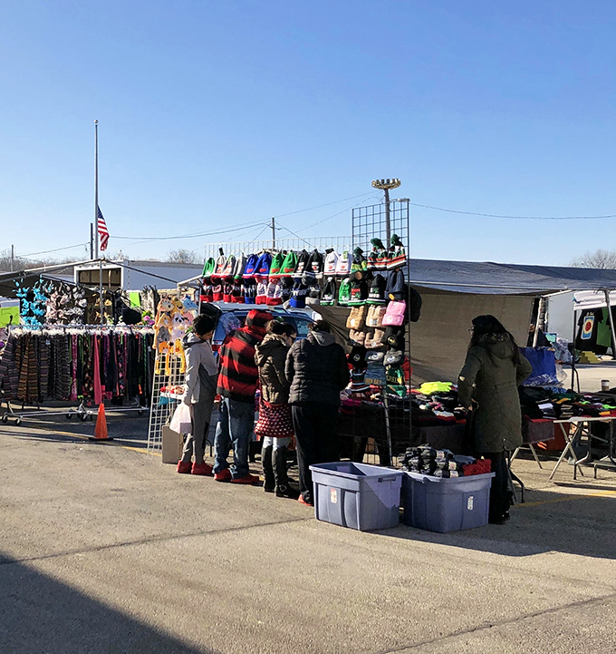 The outdoor market transforms into a social hub where the joy of discovery is matched only by the thrill of a good bargain.