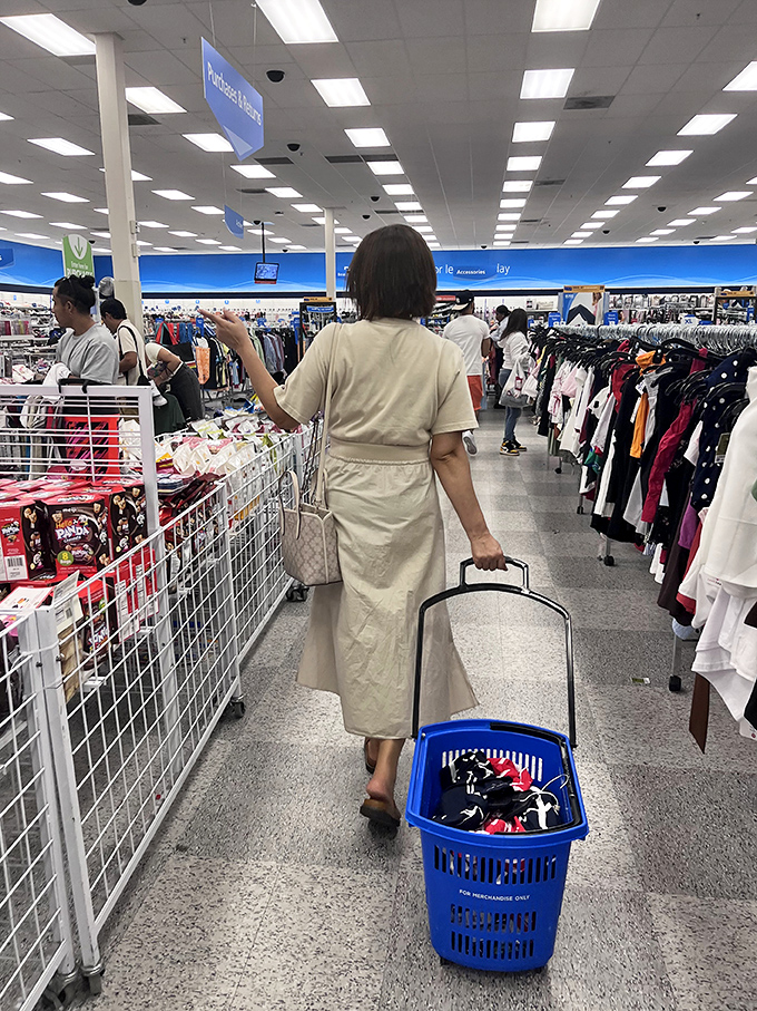 The focused determination of a shopper with a mission—note the strategic basket for maximum carrying capacity and minimal arm strain.