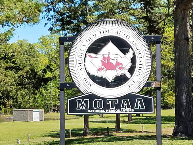 The MOTAA sign stands sentinel in the Arkansas landscape, a beacon for those who speak the universal language of carburetors and chrome.