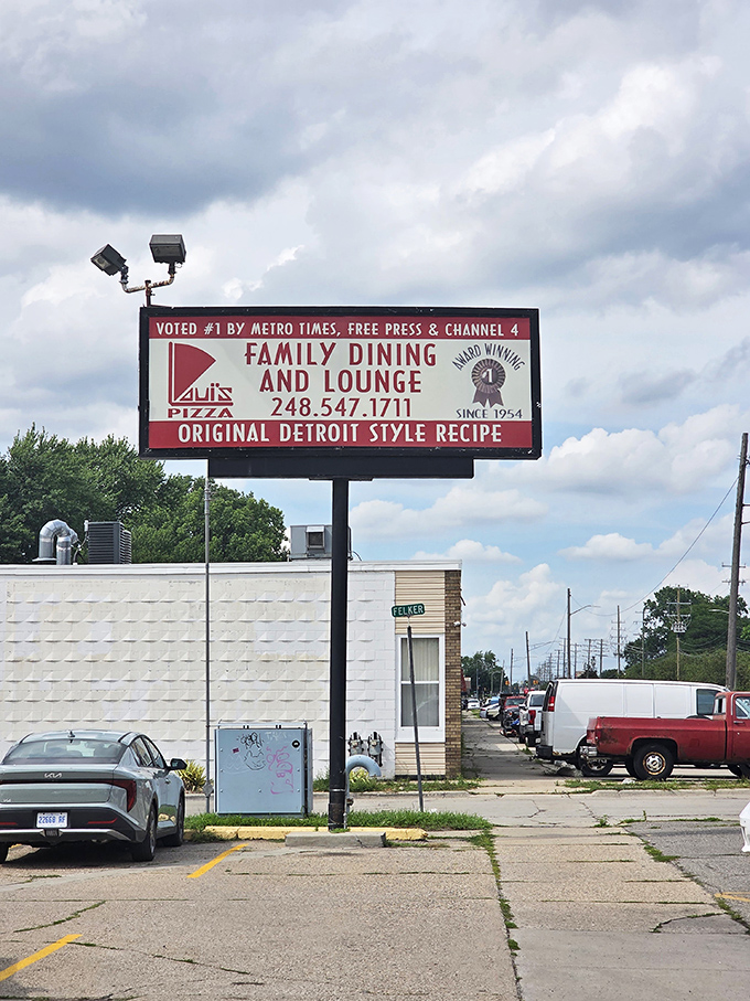 The sign proudly announces what locals already know: this isn't just pizza—it's a Detroit institution with the awards to prove it.