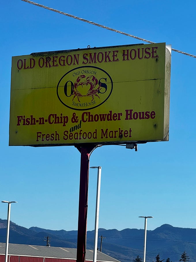 The sign promises exactly what awaits: no fancy wordplay needed when you've mastered the art of smoke, fish, and hospitality.