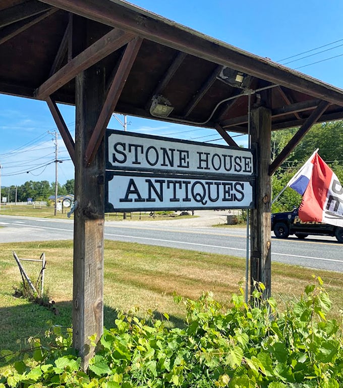 The roadside sign beckons passersby with straightforward honesty&mdash;antiques are here, and they're worth stopping for immediately.
