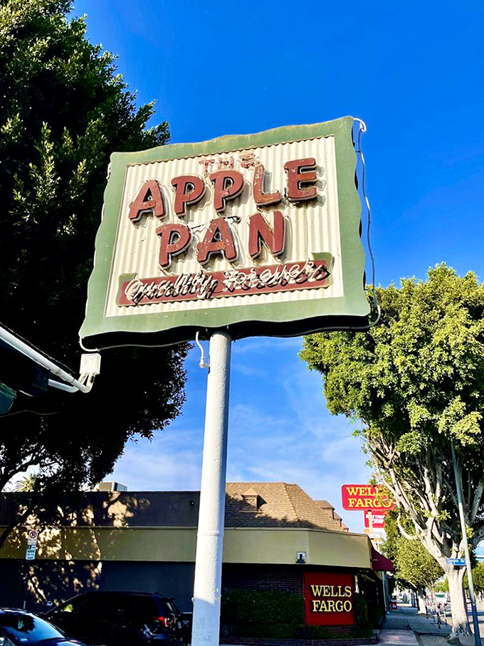 The vintage sign stands against the California sky like a beacon of hope for those seeking refuge from food trends and culinary fads.