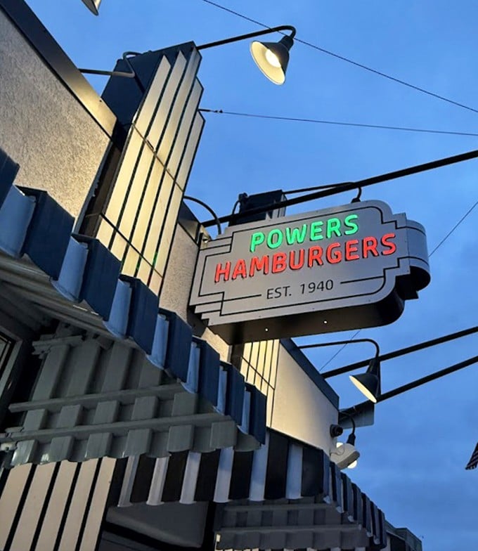 The neon glow of the Powers sign against the twilight sky&mdash;a Fort Wayne landmark that's been lighting the way to burger bliss for decades.