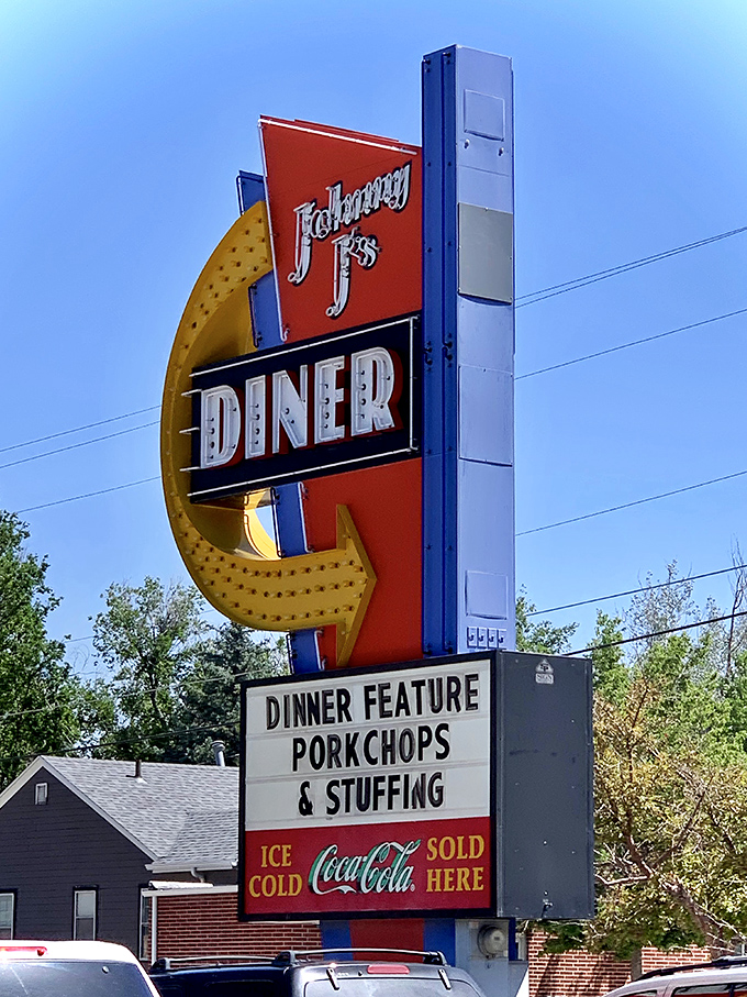 That vintage sign doesn't just advertise a diner—it announces an institution. The pork chops and stuffing special is just a bonus.