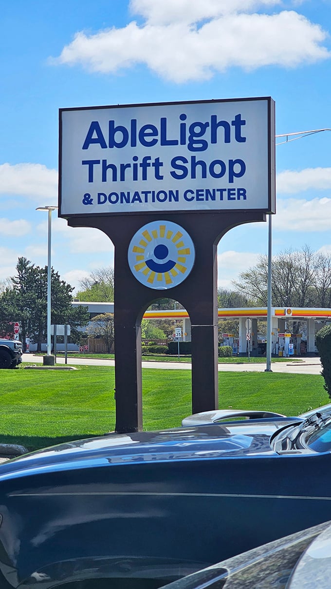 The sign beckons like a lighthouse to bargain hunters, promising treasures and purpose with every purchase.