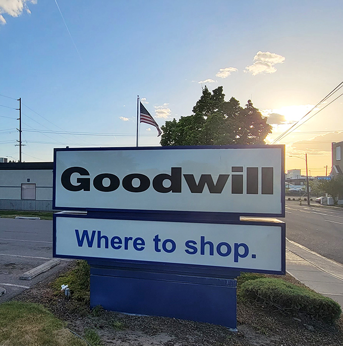 As the sun sets behind Goodwill's iconic signage, the promise of tomorrow's treasures awaits. Early birds get the best secondhand worms!