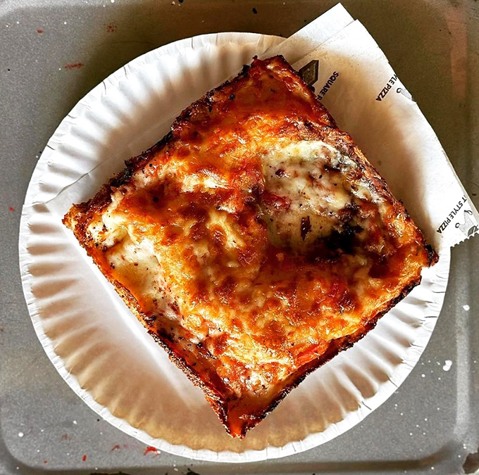 Drive-in dining done right&mdash;this perfectly charred square pizza delivers the essential combination of cheese pull and crispy edges.