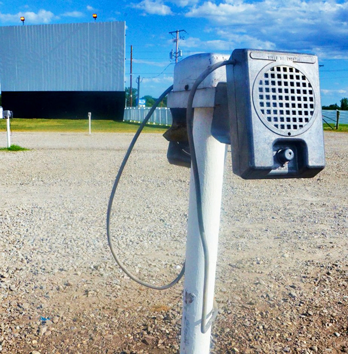 The vintage speaker post, a charming relic from drive-in days of yore, now mostly replaced by your car's FM radio.