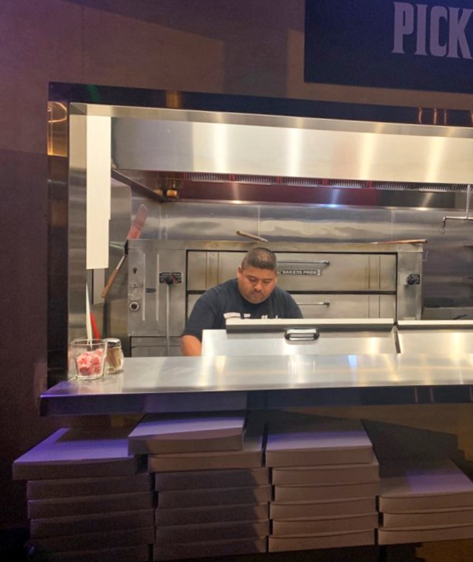 Behind every great slice is a dedicated pizza artisan, transforming simple ingredients into edible masterpieces one pie at a time.