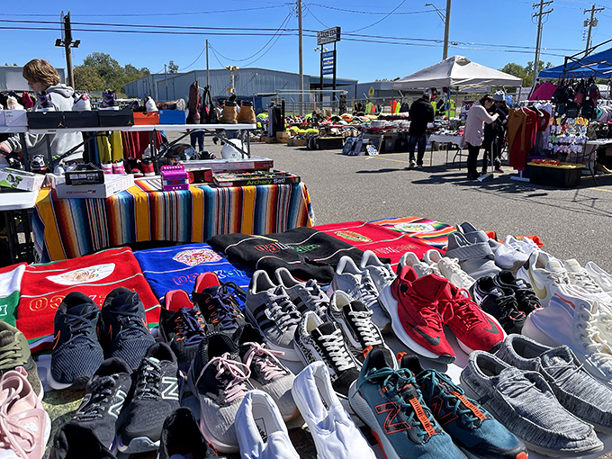 The outdoor market expands the treasure hunt into the sunshine, where sneaker collectors find their next prized kicks.