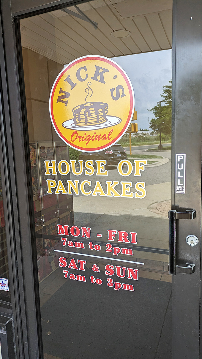 Business hours posted like a breakfast manifesto. Note the extended weekend hours&mdash;they understand the sacred nature of Sunday brunch.