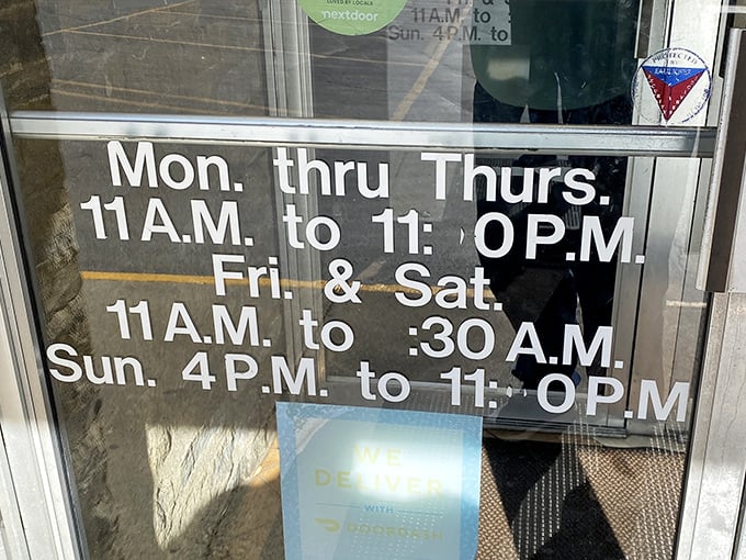 The hours posted on Tommy's door are basically a public service announcement for when happiness is being served.