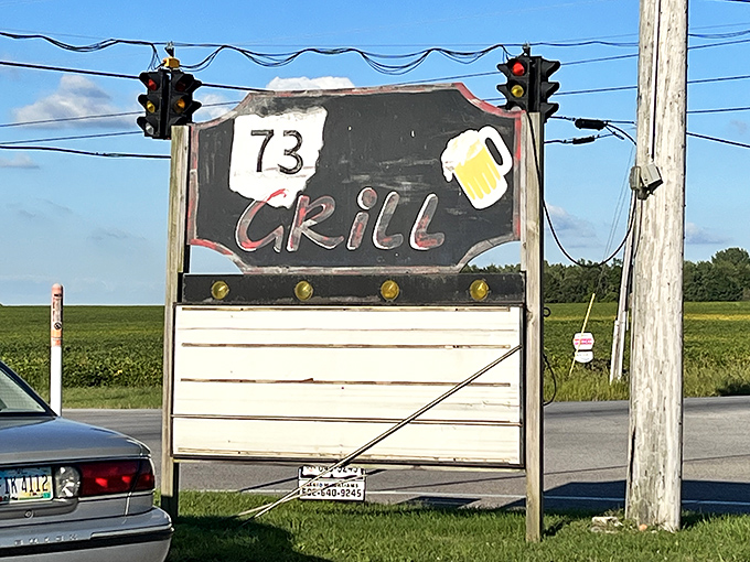 A roadside sign that beckons hungry travelers like a lighthouse guides ships. That beer mug illustration is making promises it intends to keep.