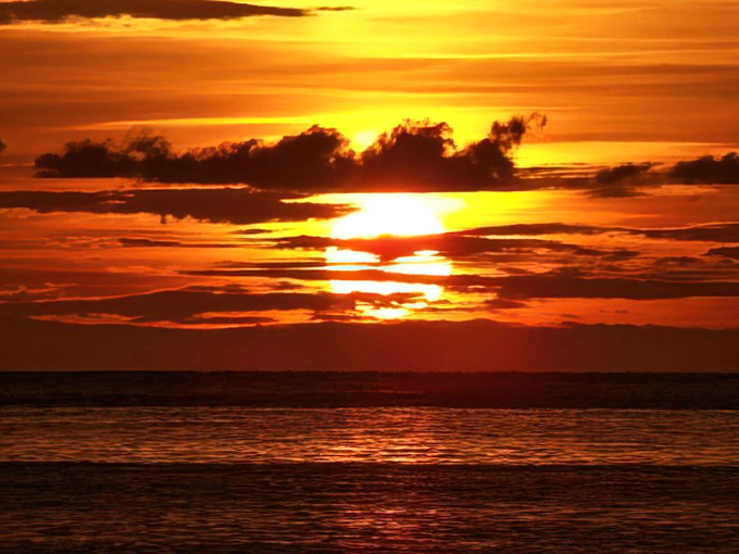 Nature's farewell performance of the day. The sun takes its final bow in a spectacular display that outshines any Vegas production.