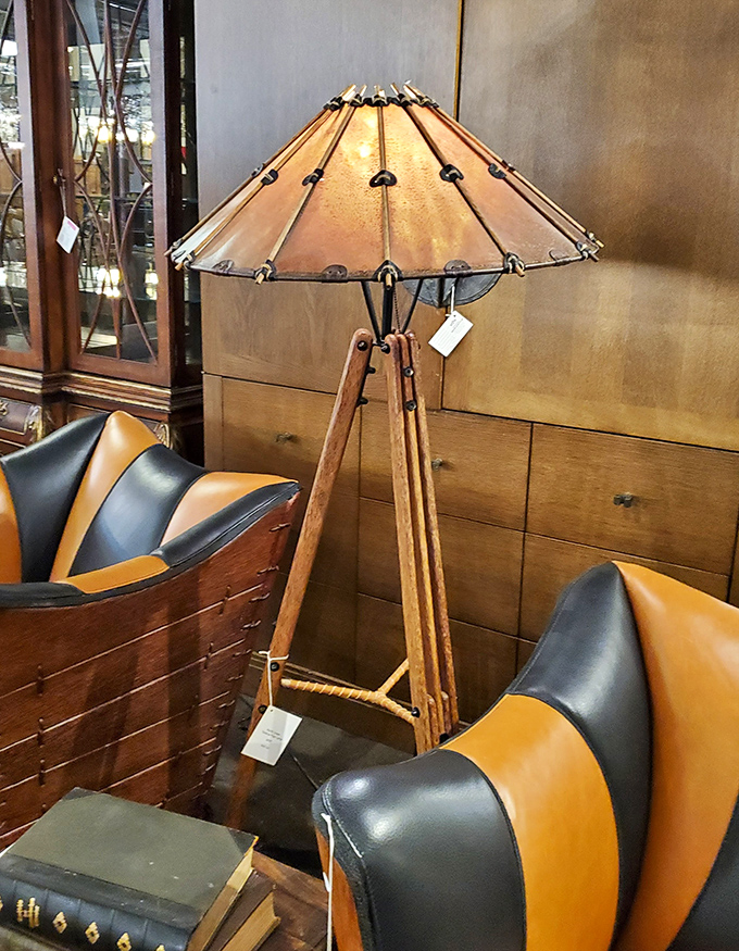 A tripod lamp that bridges rustic and refined, like a lumberjack who secretly reads poetry and knows which fork to use.