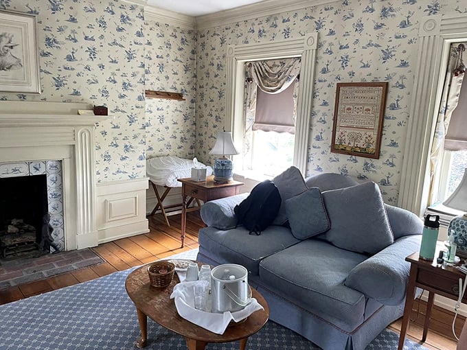 The Washington Room features delicate blue toile wallpaper and period furnishings fit for our first president himself.