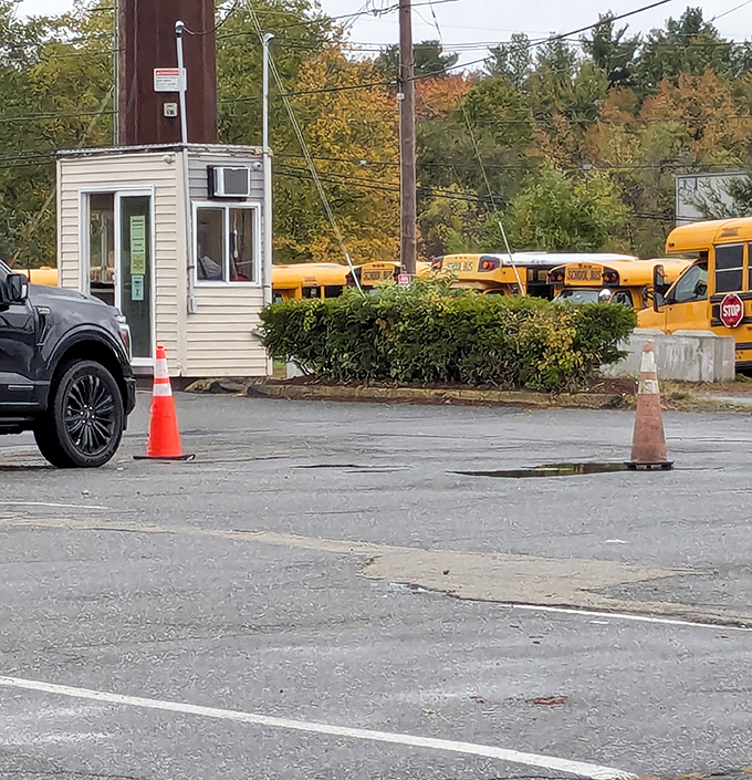 The humble gatekeeper's booth, where flea market adventures begin. Those yellow school buses in the background are probably filled with treasures too.
