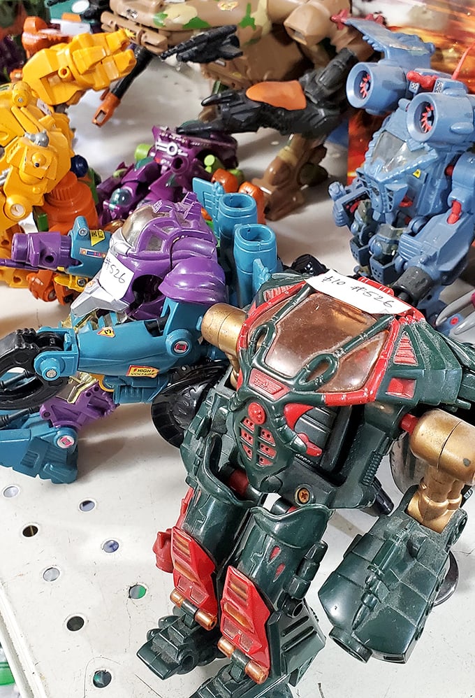 Vintage action figures locked in eternal plastic combat&mdash;these colorful warriors have survived decades of play to become collectible treasures.