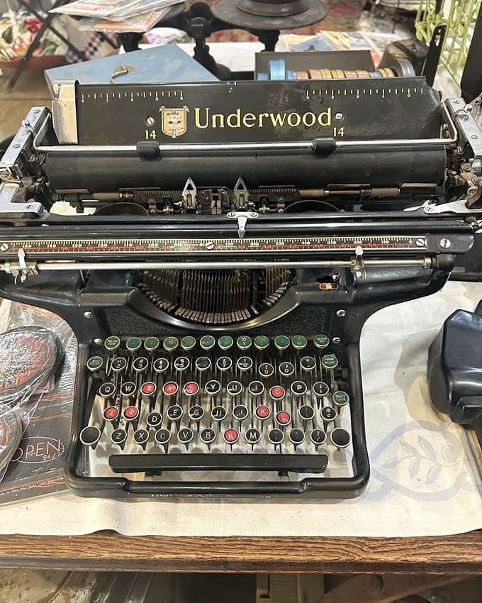An Underwood typewriter stands ready for its next great American novel, its keys holding the ghosts of letters, stories, and manifestos past.