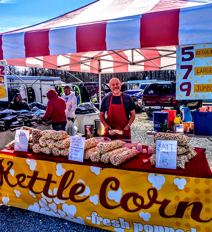 The kettle corn vendor's smile is as warm as his freshly popped treats&mdash;proof that simple pleasures still make the best memories.