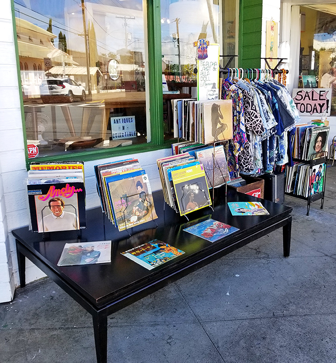 Vinyl records when they were just called "records." Album covers that doubled as art, displayed outside the store like a sidewalk gallery.