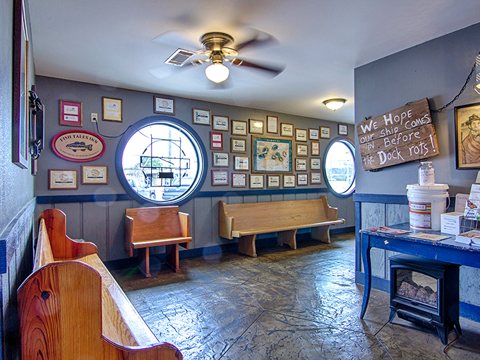 Circular porthole windows and wooden church pews in the waiting area remind you this is both a seafood joint and a sacred Arkansas institution.