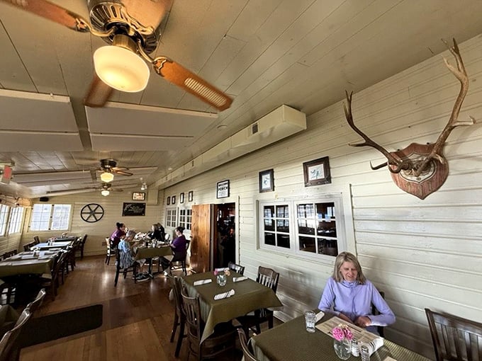 Mounted antlers and wooden walls&mdash;because you can't fully appreciate walleye without a deer watching you eat it.