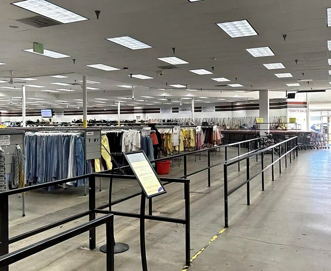 The organized chaos of thrift shopping spreads before you, promising adventure in every aisle you explore.