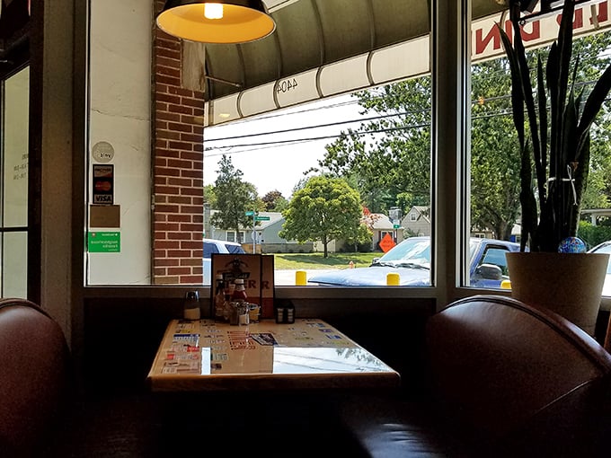 Window seats: nature's television for the patient diner. Watch the neighborhood go by while contemplating the important things&mdash;like whether to order pie.