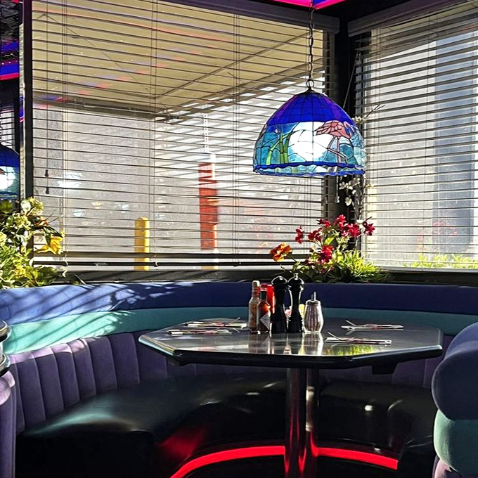 Sunlight filtering through Tiffany-style lamps creates little pools of color on tables where countless Vegas stories have unfolded over coffee and pancakes.