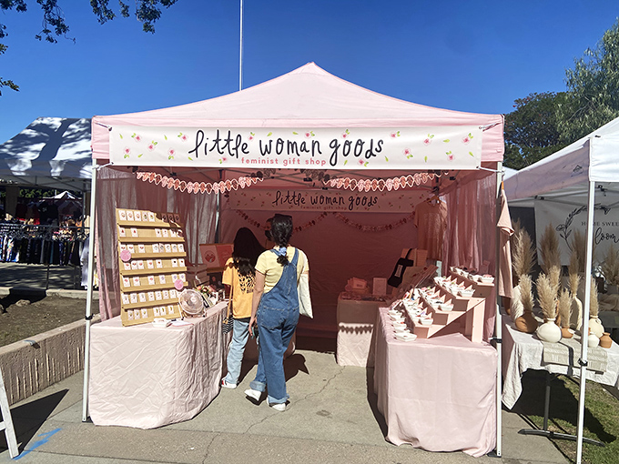 The "Little Woman Goods" tent creates a pink oasis of feminist flair. Gift shopping that combines girl power with Instagram-worthy aesthetics.