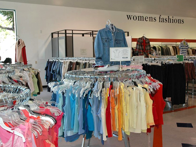 Color-coded clothing heaven. The rainbow of options makes finding that perfect summer blouse feel like a treasure hunt with rewards.
