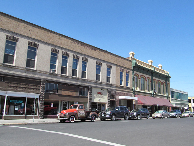 Forested hills embrace this town like nature's own affordable housing development plan.
