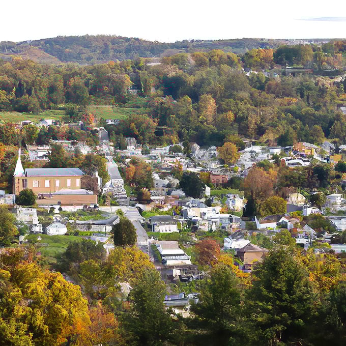 From above, Towanda reveals itself as a perfect patchwork of community, nestled between autumn-painted hills and protected by their embrace