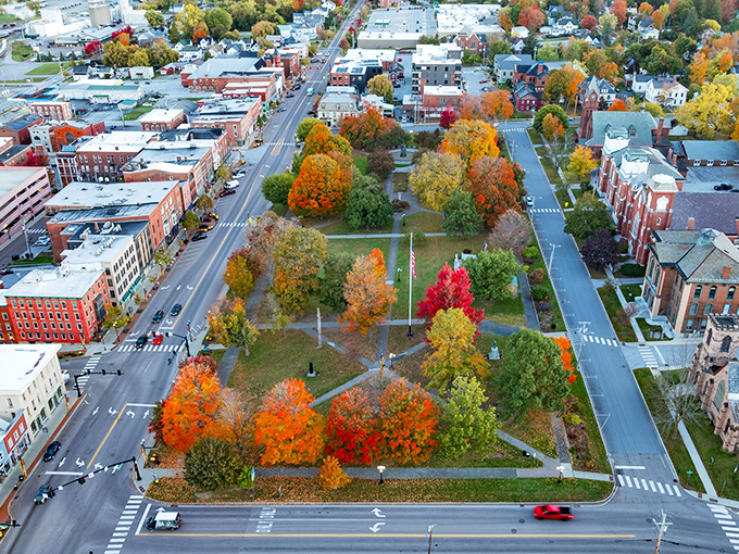 Fall paints Taylor Park in nature's most vibrant palette. From above, St. Albans reveals itself as a perfect grid of history surrounded by autumn's masterpiece.