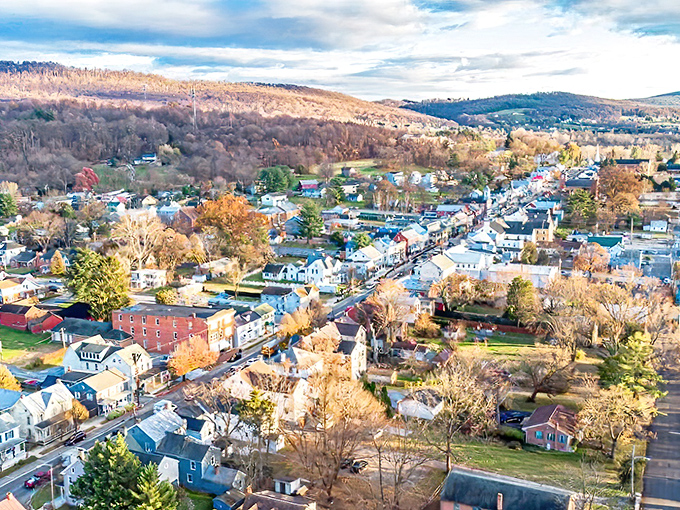 From above, Boonsboro nestles into Maryland's rolling landscape like a village from a storybook, surrounded by autumn hills painted in watercolor hues.