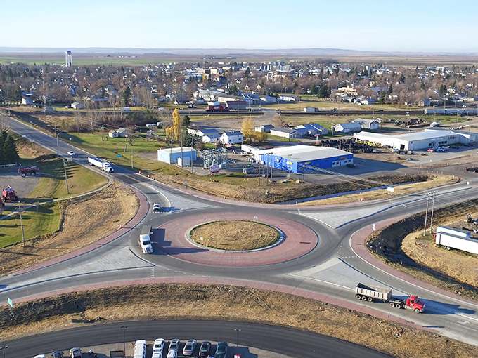 From above, Carrington reveals its perfect positioning at the crossroads of accessibility and escape&mdash;where roundabouts bring order to prairie intersections.