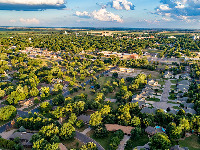 From above, Abilene reveals itself as an emerald oasis on the plains, where tree-lined streets embrace neighborhoods rich with history.