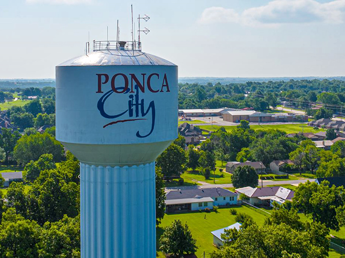 Ponca City's water tower stands sentinel over neighborhoods where lawns are green, houses are affordable, and retirement dollars stretch like summer evenings.