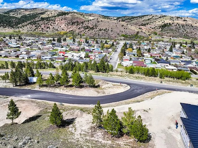 Anaconda spreads across the valley floor like a patchwork quilt of affordability, where mountain views come standard with every property.