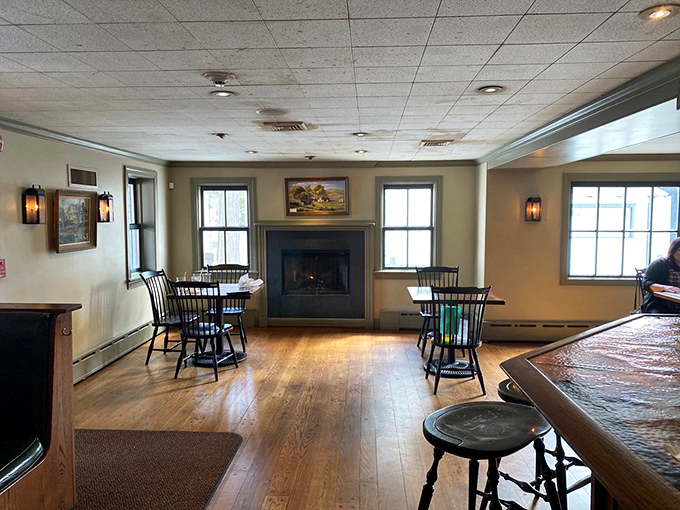 A fireplace anchors this cozy dining space, promising warmth and comfort even on the chilliest Delaware evenings&mdash;the restaurant equivalent of a hug.