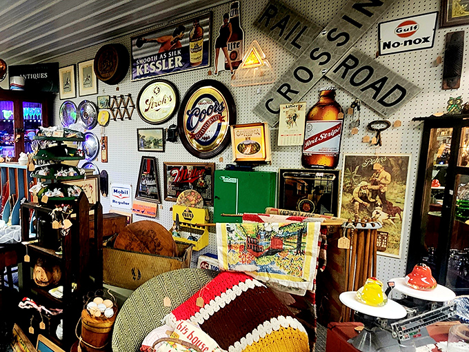 Vintage advertising signs creating a nostalgic man cave that would make any collector's heart skip beats.